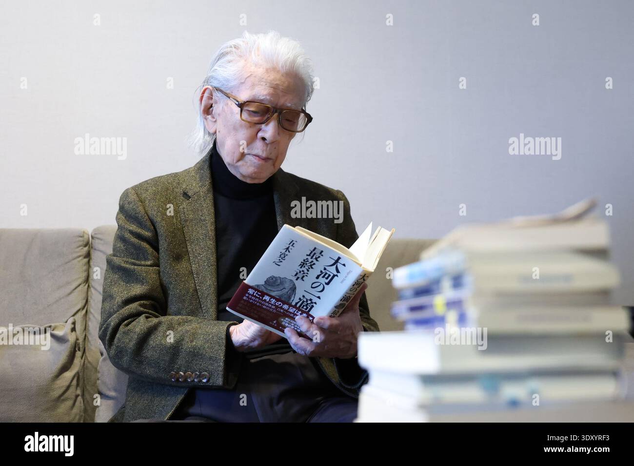 Japanese novelist Hiroyuki Itsuki poses for photo during an interview ...