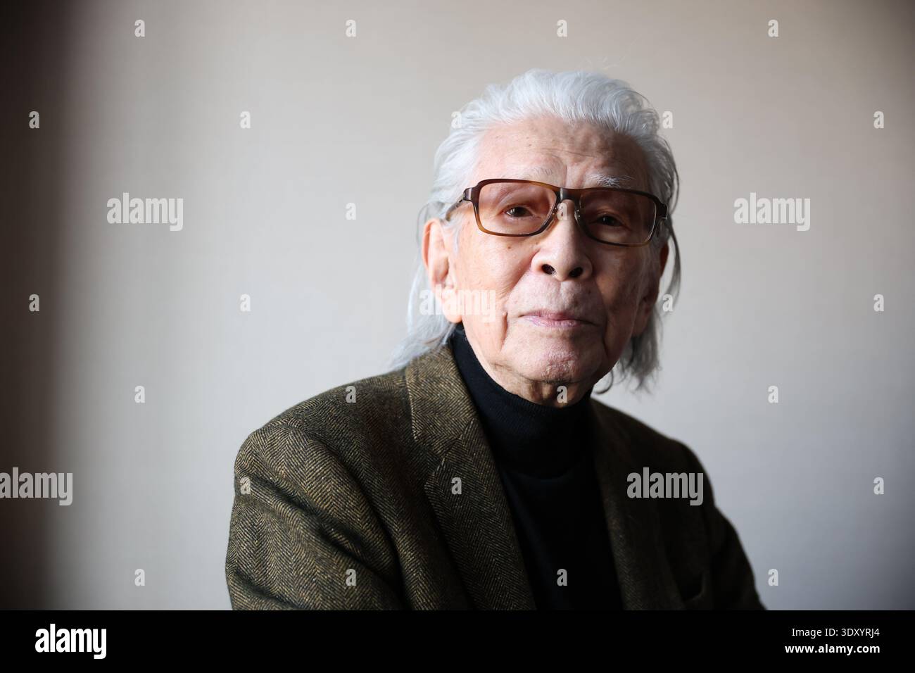 Japanese novelist Hiroyuki Itsuki poses for photo during an interview ...