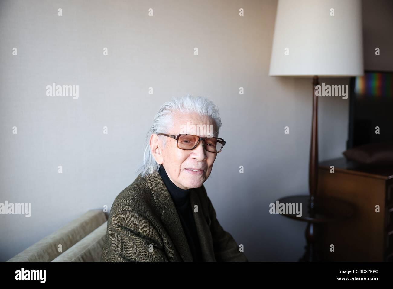 Japanese novelist Hiroyuki Itsuki poses for photo during an interview ...