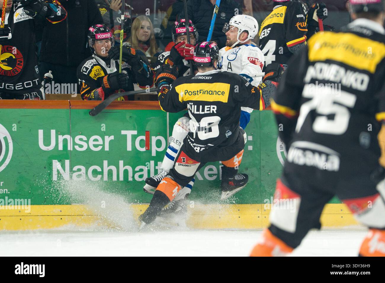 BERN, SWITZERLAND - MARCH 5: Marco Muller of Bern L) battles for the ...