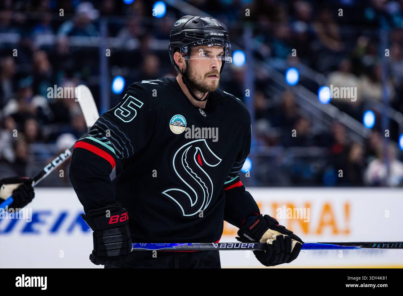 Seattle Kraken defenseman Ryan Lindgren looks on during an NHL hockey ...