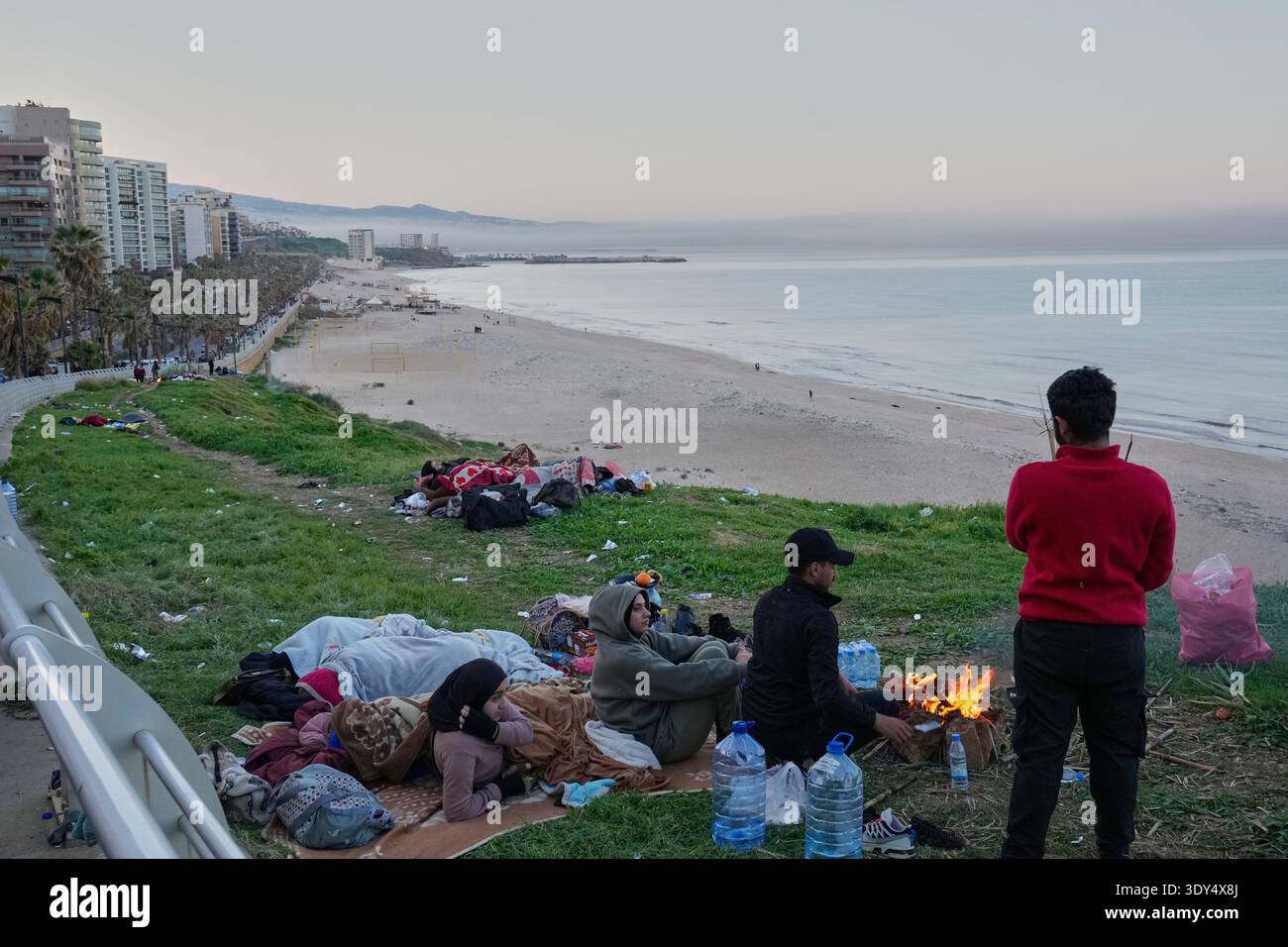 Displaced people fleeing Israeli airstrikes in Beirut's southern suburb ...
