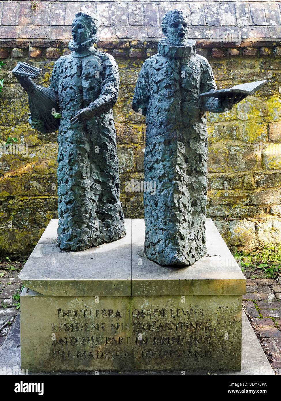 Madrigal Singers Statue shows two figures with musical instruments in a ...