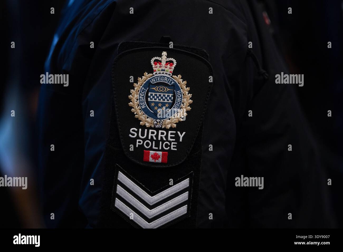 A Surrey Police patch is worn by an officer at RCMP "E" Division ...