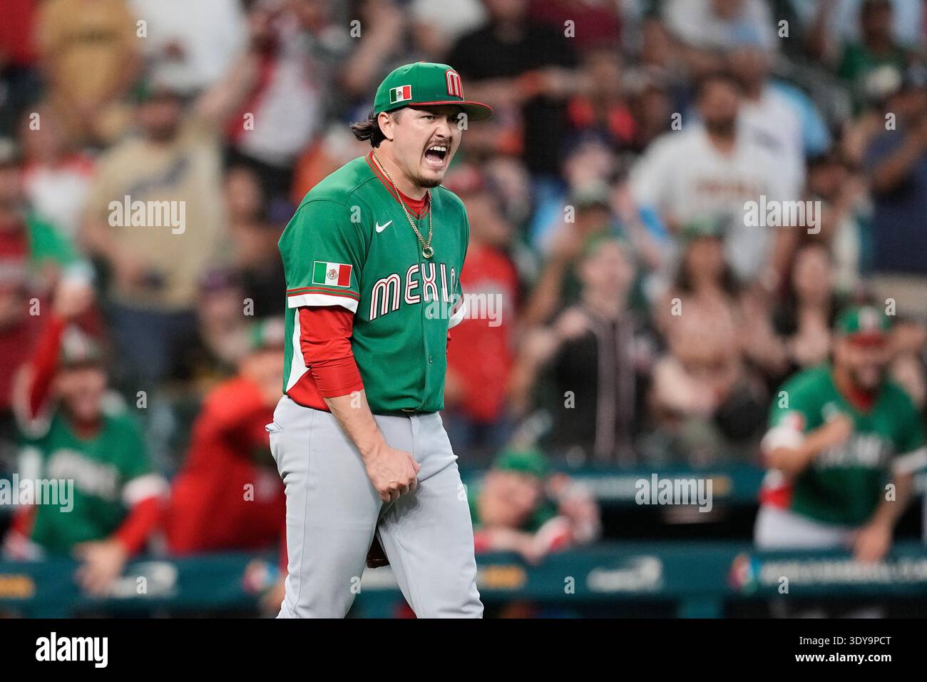 Mexico pitcher Victor Vodnik reacts after Britain's Kristian Robinson ...