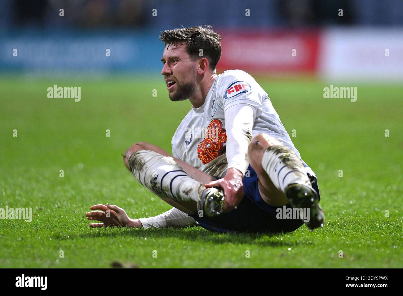 Preston North End's Callum Lang appears in pain during the Sky Bet ...
