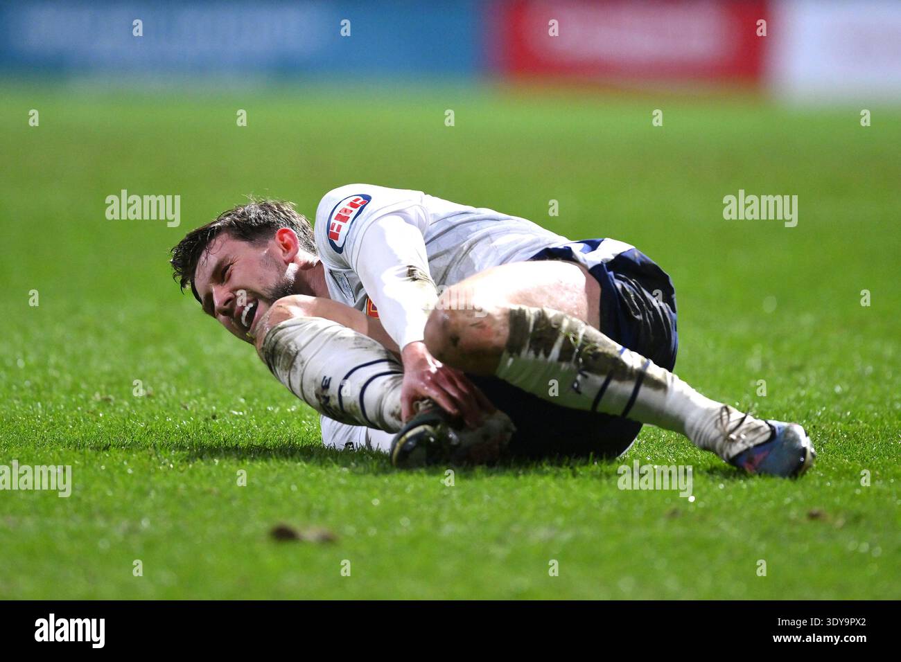 Preston North End's Callum Lang appears in pain during the Sky Bet ...