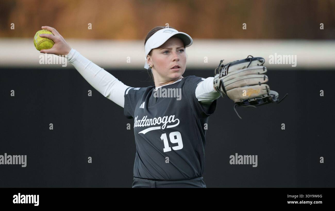 Chattanooga infielder Abi Bunt (19) throws during an NCAA softball game ...
