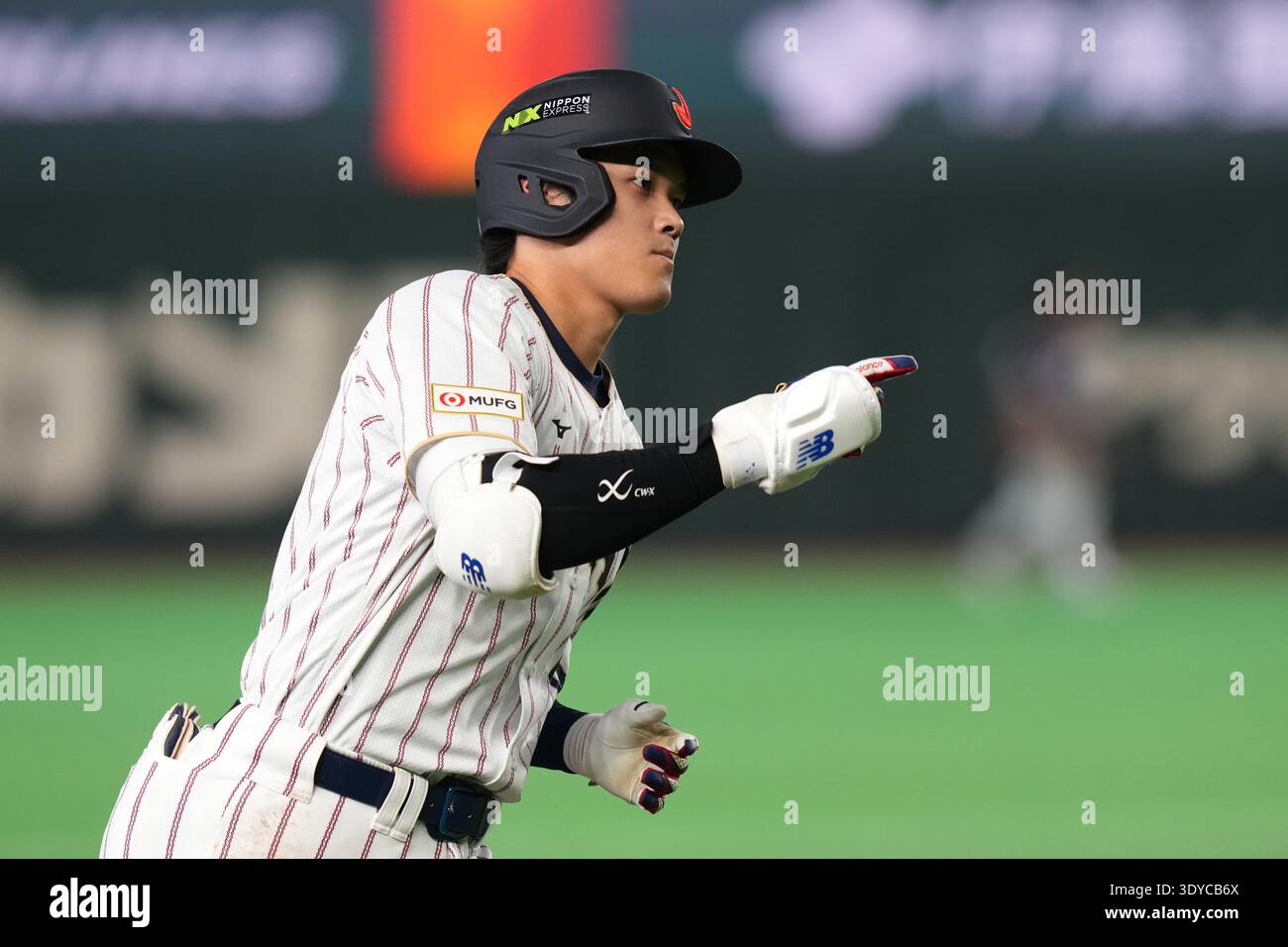 Japan's Shohei Ohtani reacts after hitting home run during the third ...