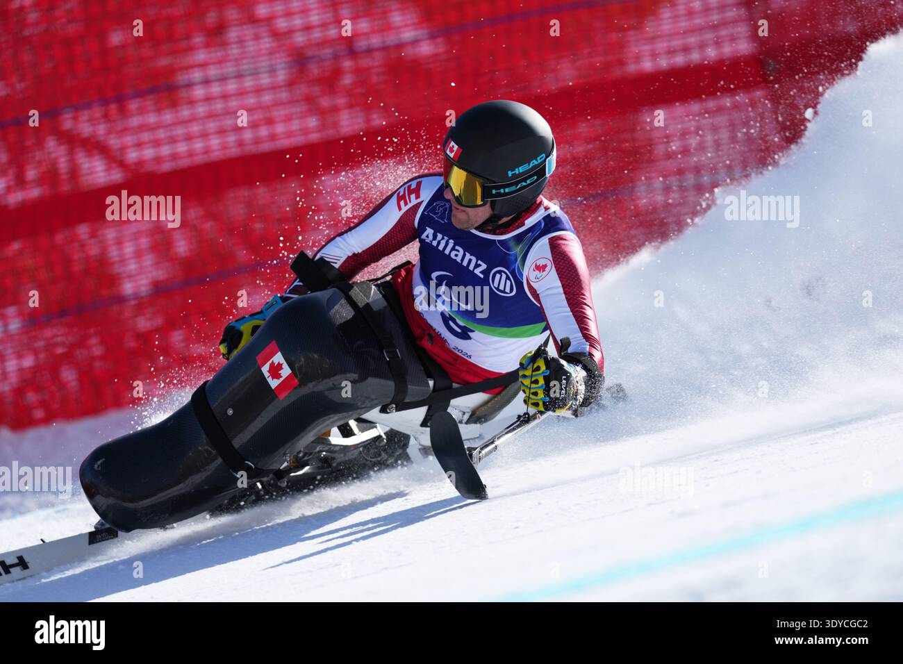 Brian Rowland, of Canada, competes in the alpine skiing men's downhill ...