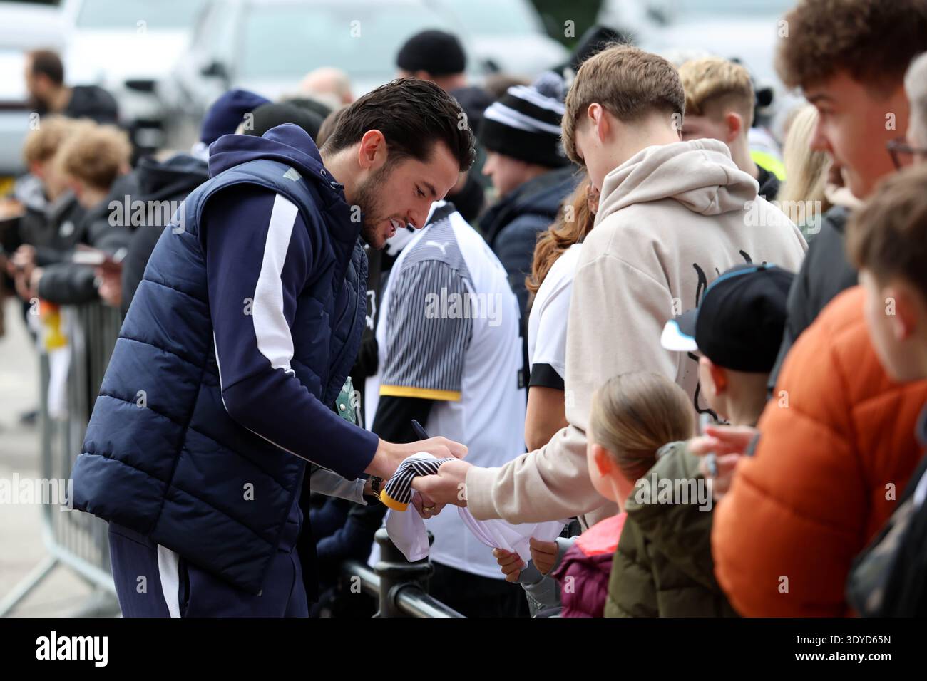 Derby County's Lewis Travis meets fans outside the stadium before the ...