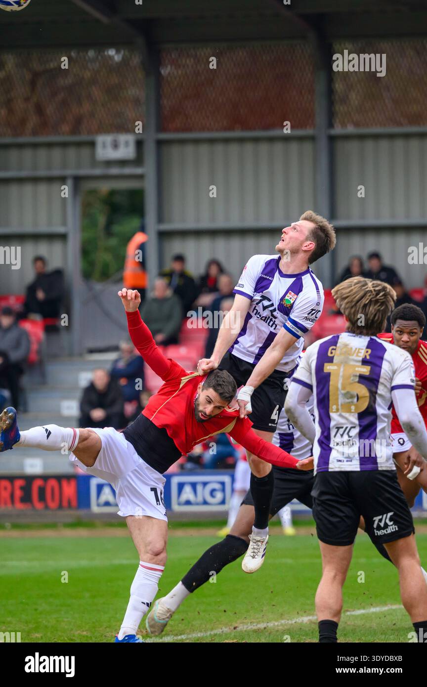 Daniele Collinge of Barnet FC holds Fabio Borini of Salford City FC ...