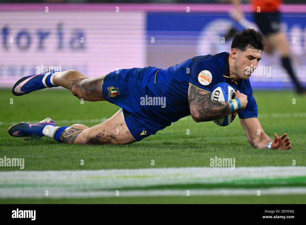 Tommaso Menoncello of Italy dives in to score a try during the Guinness ...