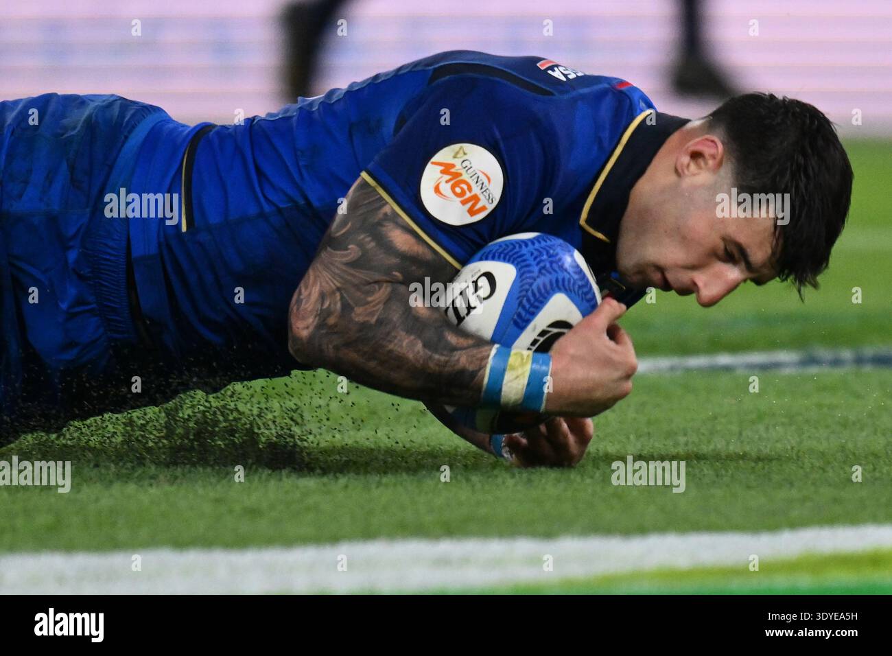 Tommaso Menoncello of Italy dives in to score a try during the Guinness ...