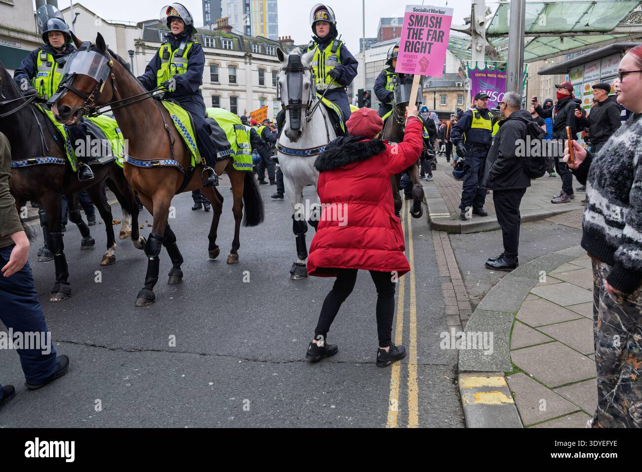 Bristol, UK. 7th Mar, 2026. Police are pictured as they separate anti ...