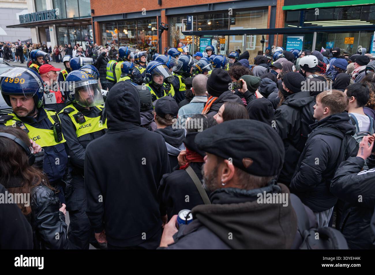 Bristol, UK. 7th Mar, 2026. Police are pictured as they separate anti ...