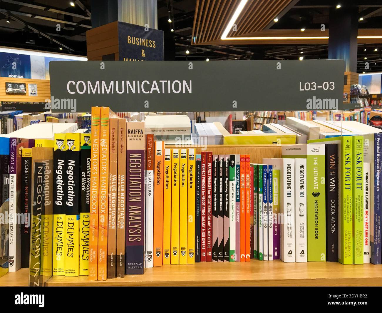 Communication section in a modern bookstore with subject signage Stock ...