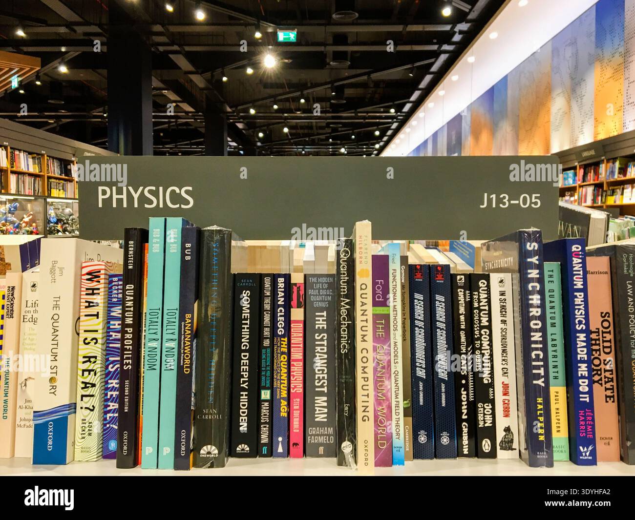 Physics section in a modern bookstore with subject signage Stock Photo ...