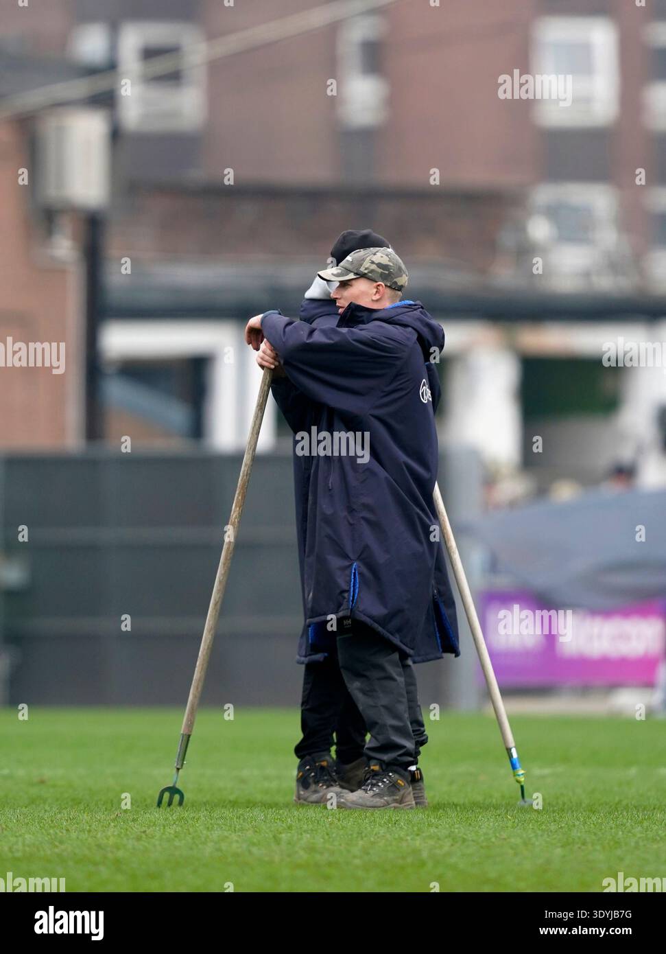 Burslem, England, 8th March 2026. Groundsmen prepare the pitch before ...
