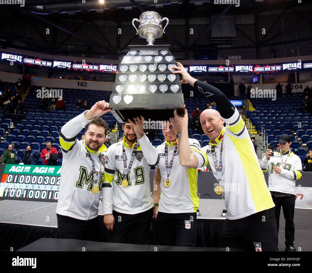Team Manitoba-Dunstone, from left to right, Matt Dunstone,, Colton Lott ...