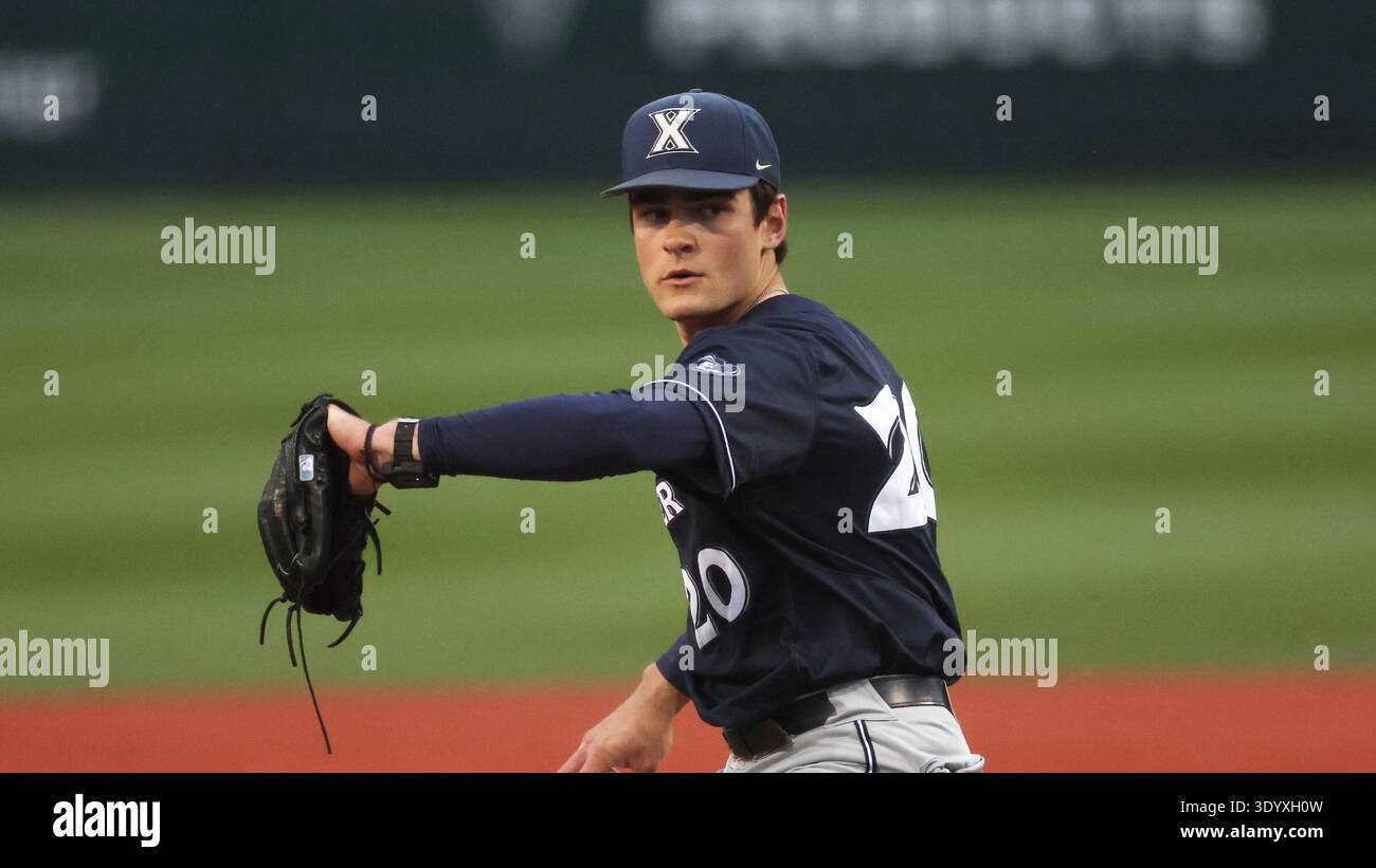 Xavier pitcher Ryan Piech (20) throws during an NCAA baseball game ...