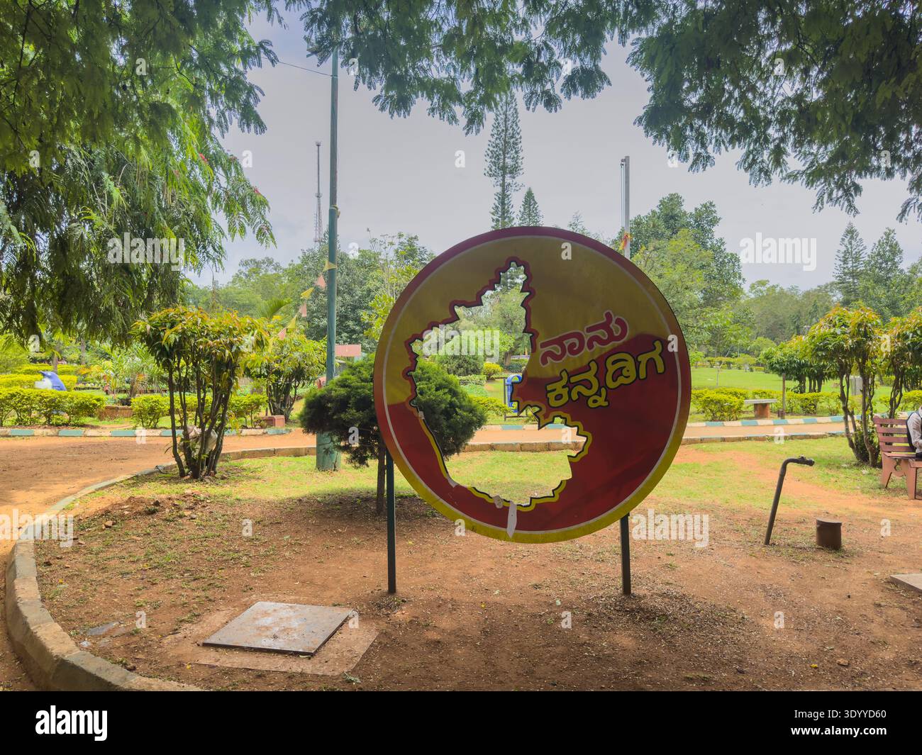 Karnataka state map sign with Kannada text “Naanu Kannadiga” meaning “I ...
