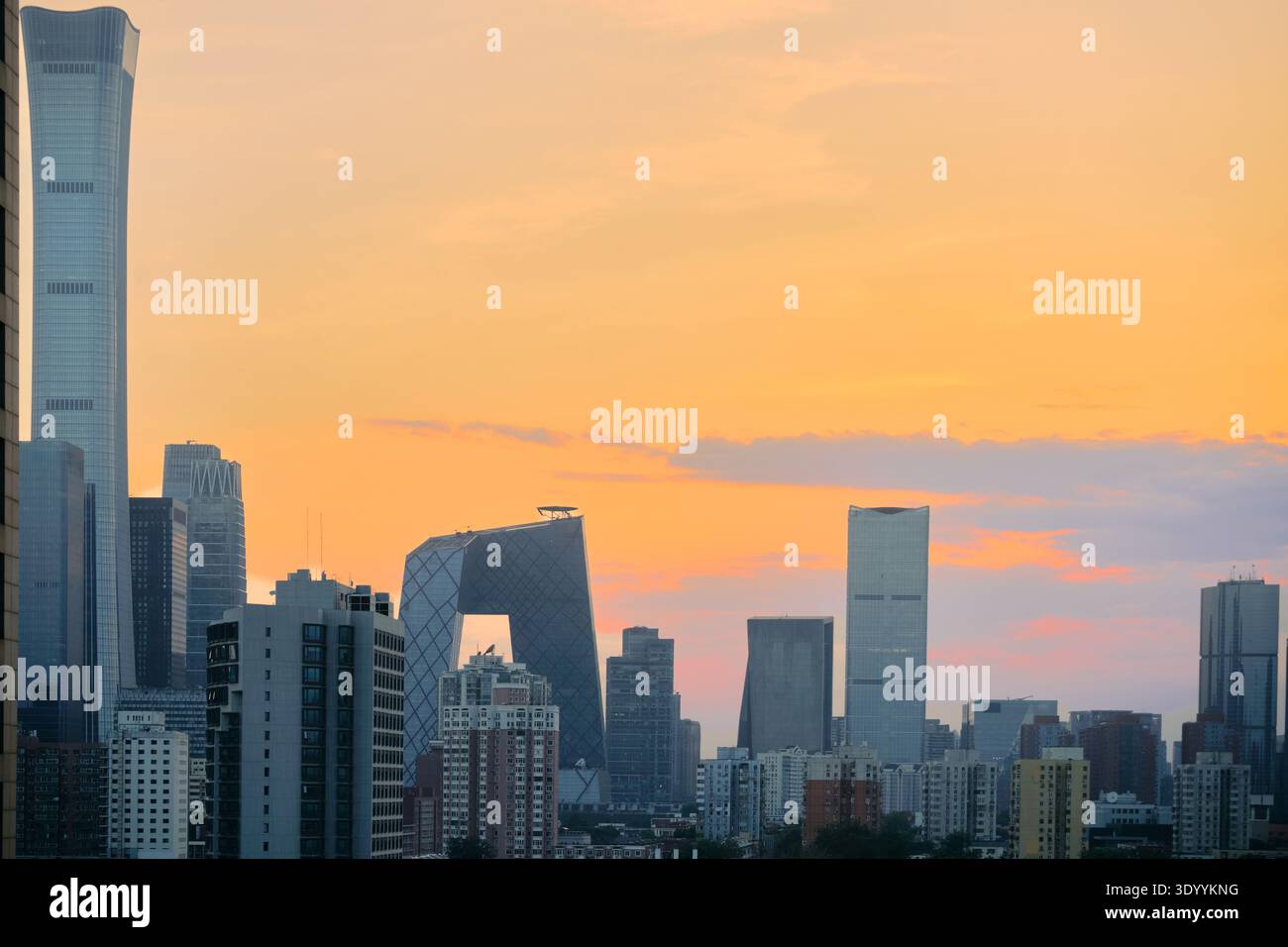 Beijing evening cityscape with a view of the CCTV headquarters. High ...