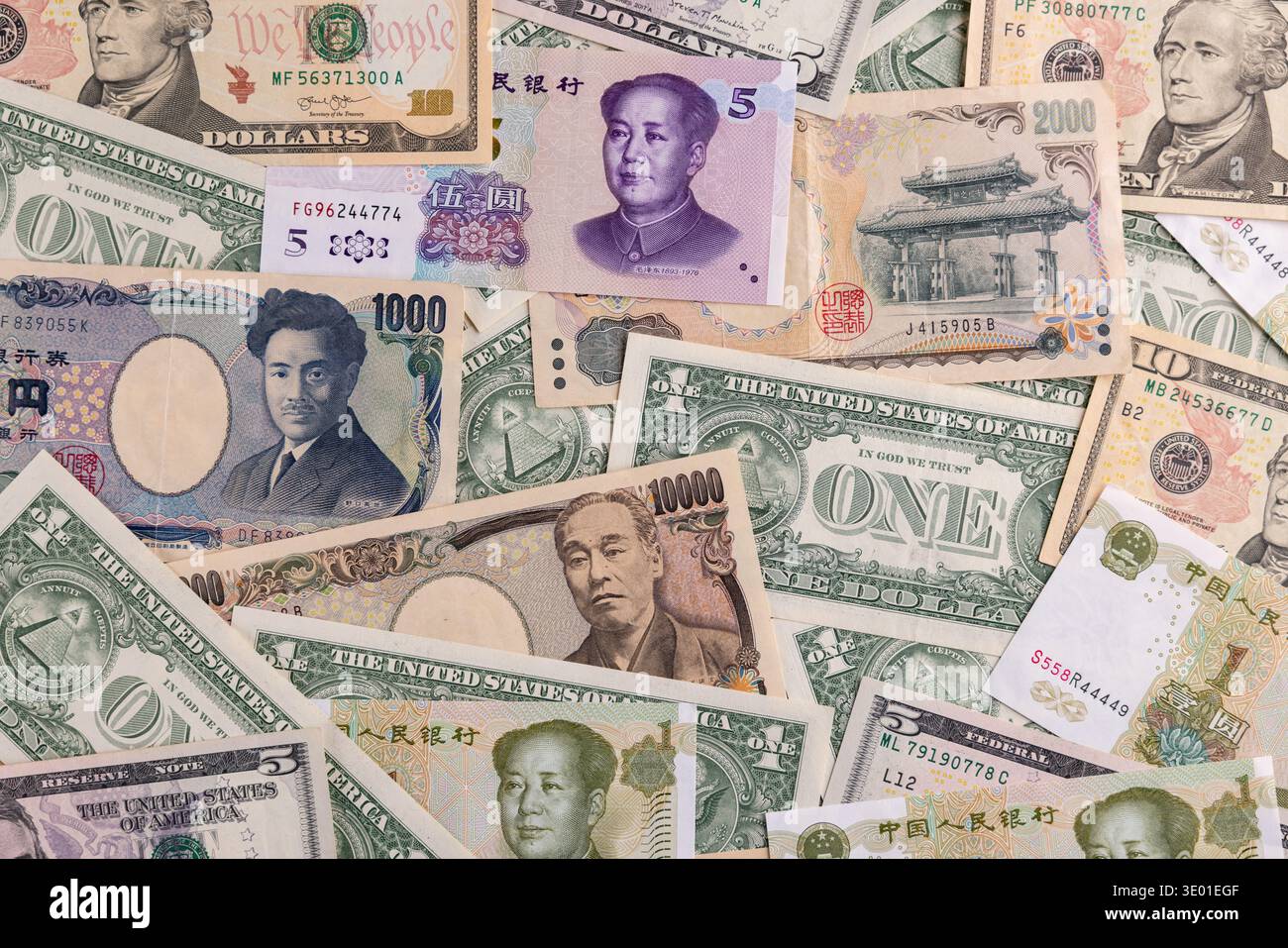 Global Currency Collage with Japanese Yen, US Dollars, and Chinese Yuan ...