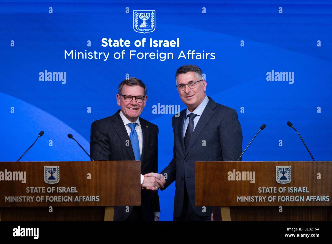 Israeli Foreign Minister Gideon Sa'ar, right, shakes hands with his ...