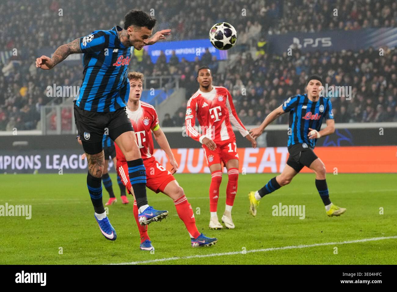 Atalanta's Gianluca Scamacca heads the ball during the Champions League ...