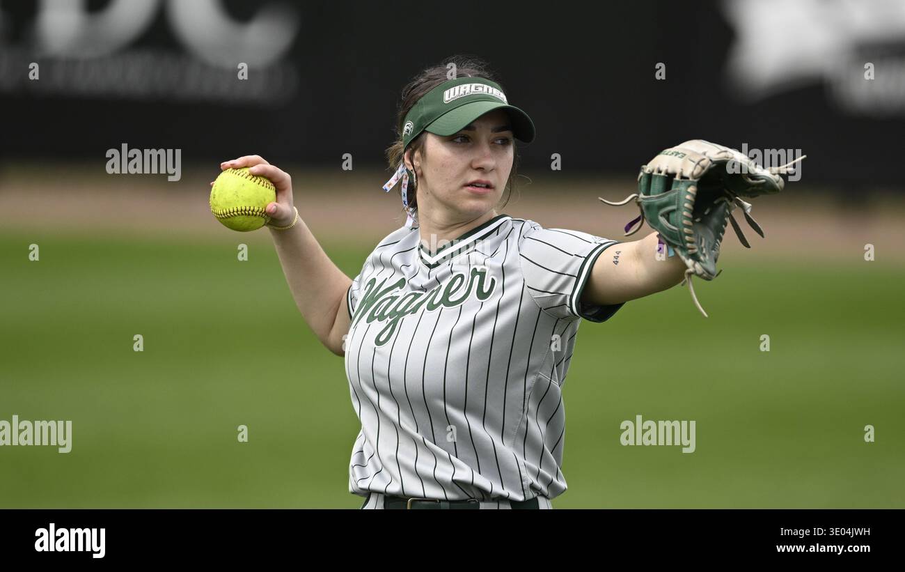 Wagner outfielder Noelle Estephan (1) throws during an NCAA college ...