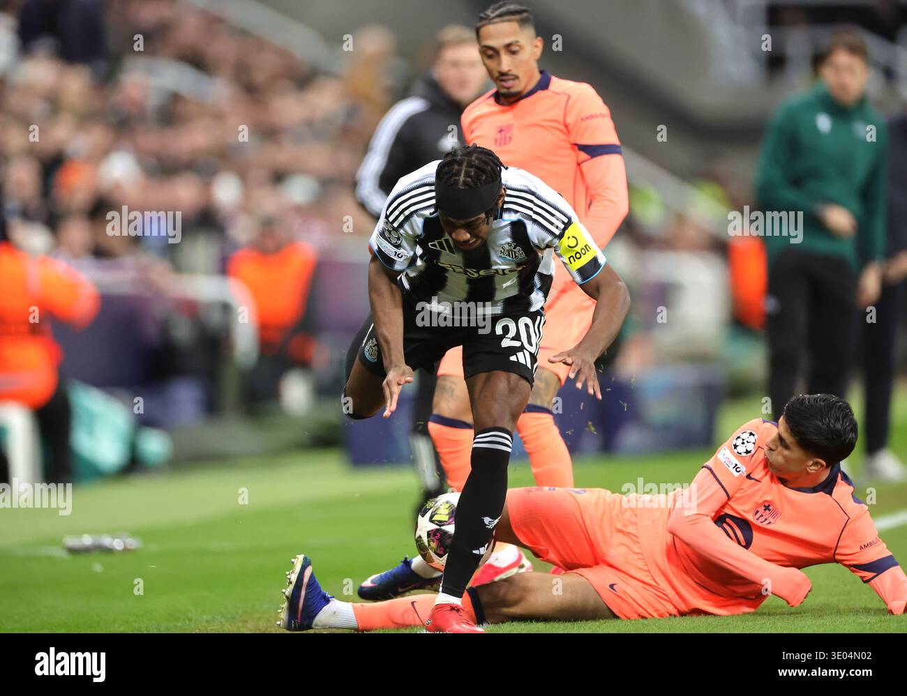Barcelona goalkeeper Cavaco Joao Cancelo (right) attempts a challenge ...