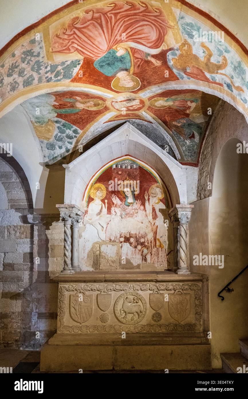 View of the stone altar in Trani Crypt, featuring heraldic reliefs and ...