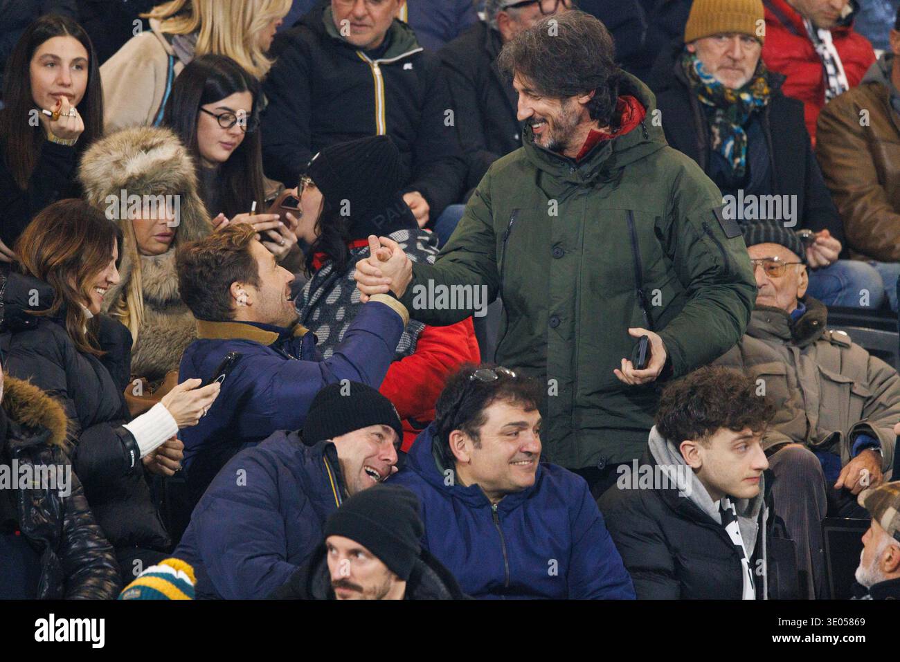 Massimiliano Ossini and a guest are seen during the match between ...