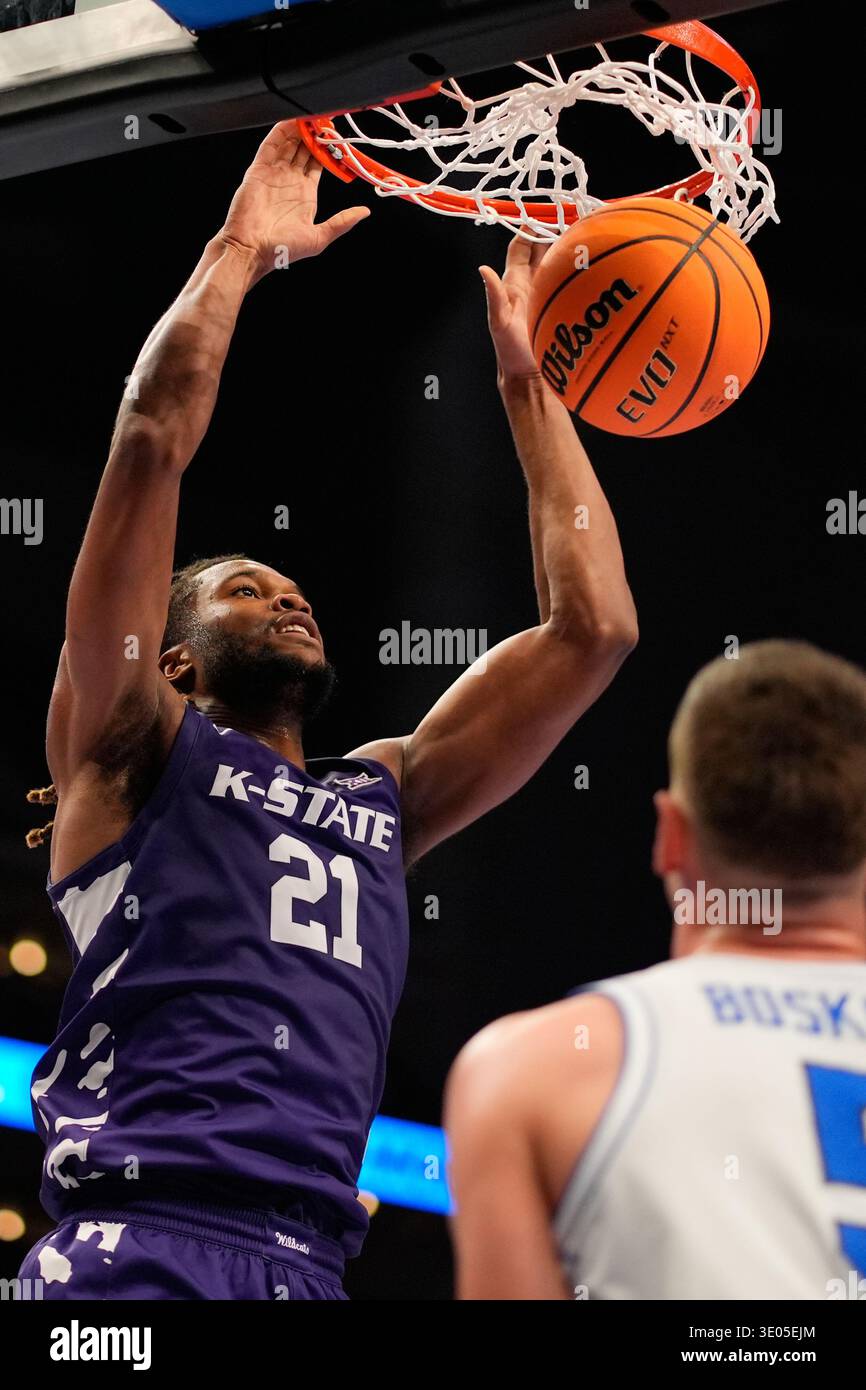 Kansas State forward Khamari McGriff dunks the ball during the first ...
