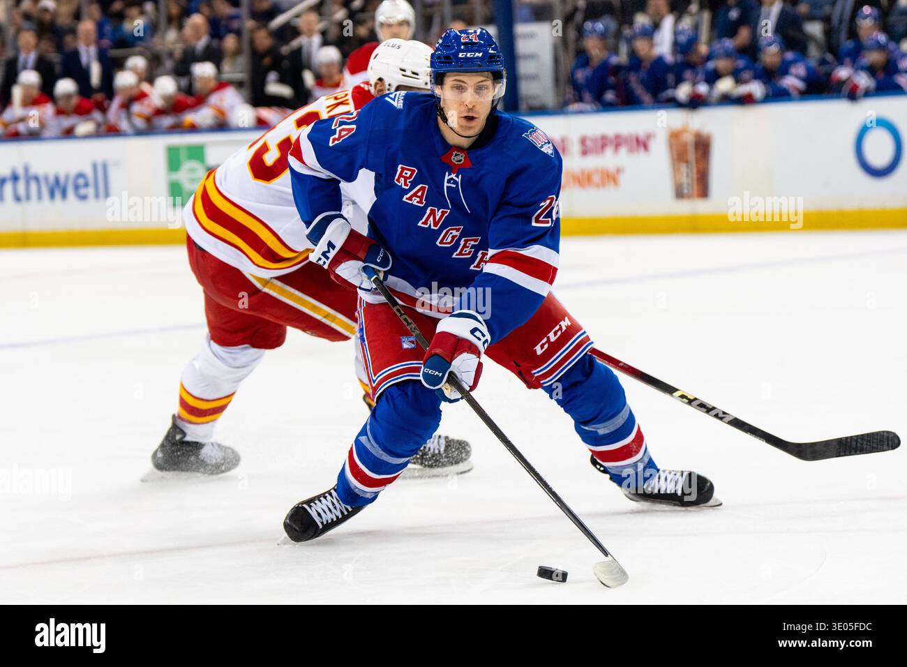 New York Rangers left wing Tye Kartye (24) skates with the puck during ...