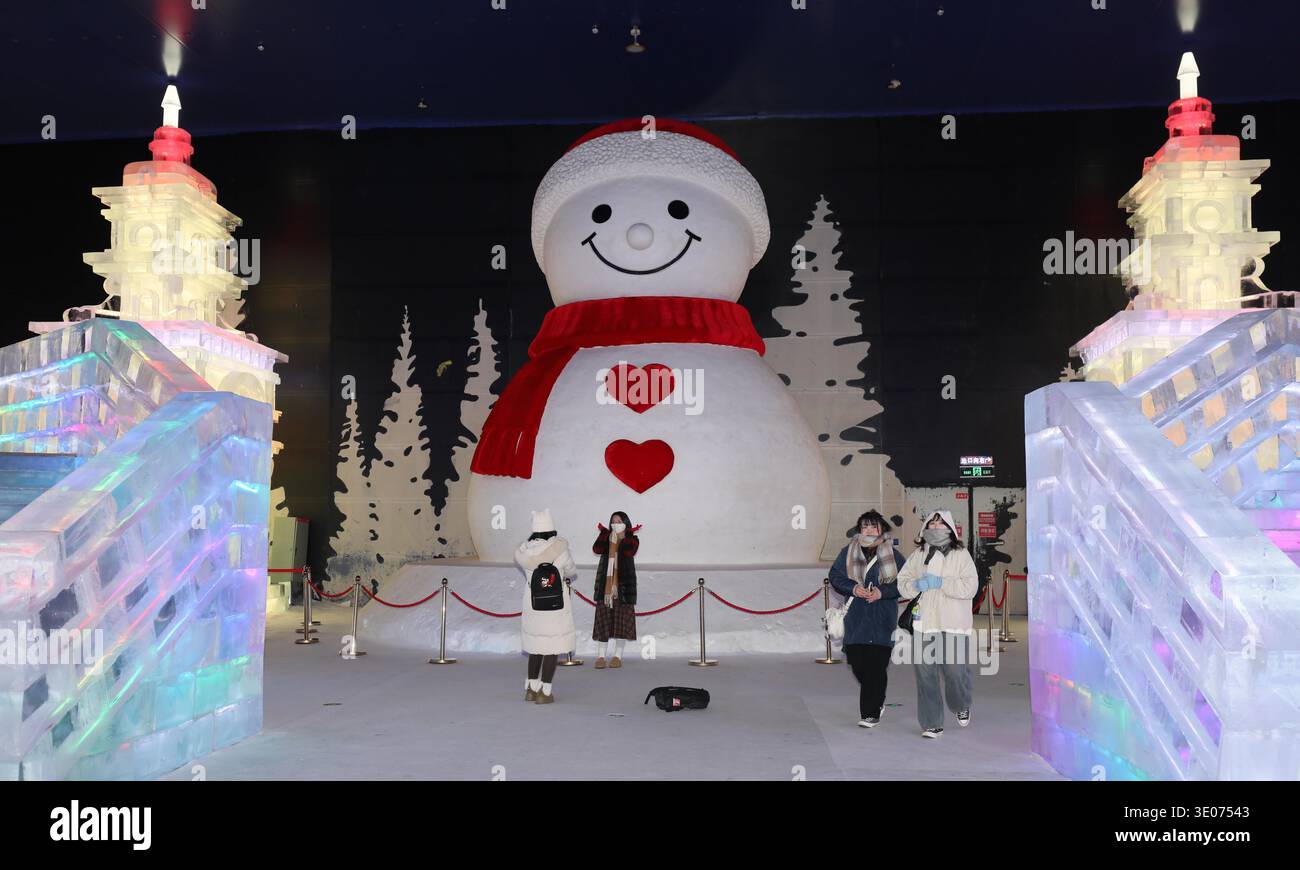Women play at the Harbin Ice and Snow World on International Women's ...