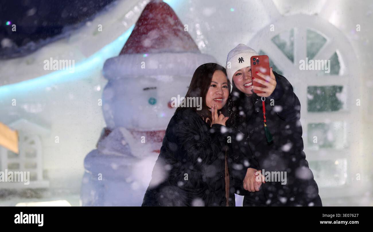 Women play at the Harbin Ice and Snow World on International Women's ...