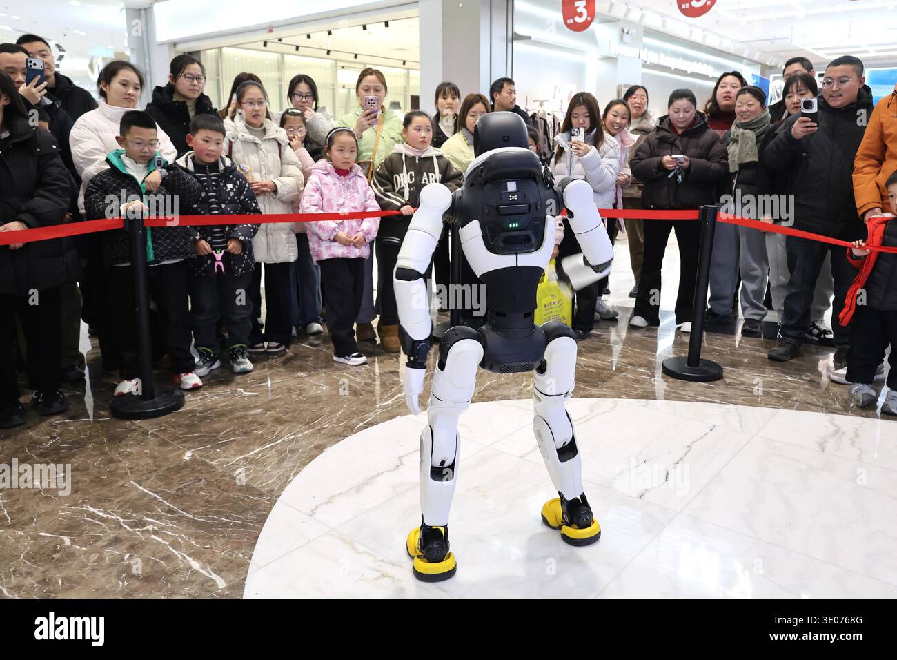 Visitors gather at a robot 4S store showroom in Jianhu County, Yancheng ...