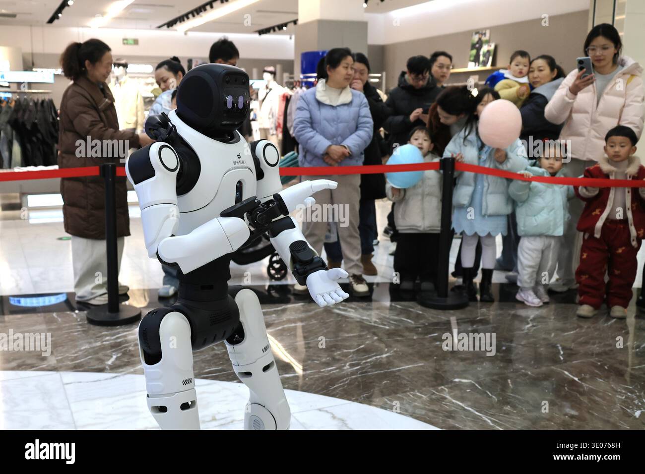 Visitors gather at a robot 4S store showroom in Jianhu County, Yancheng ...