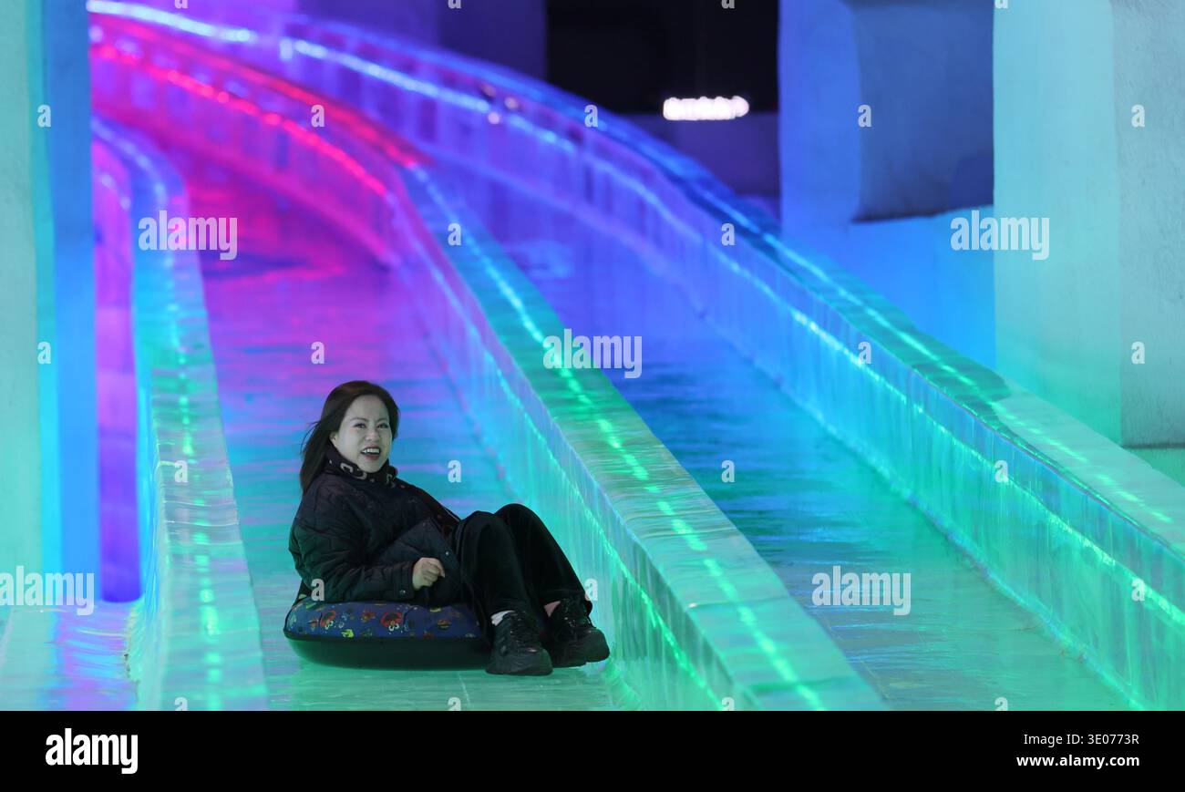 Women play at the Harbin Ice and Snow World on International Women's ...