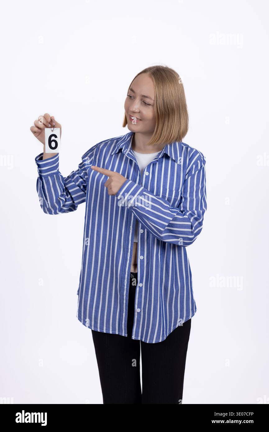 Woman in striped shirt holding hi-res stock photography and images - Alamy