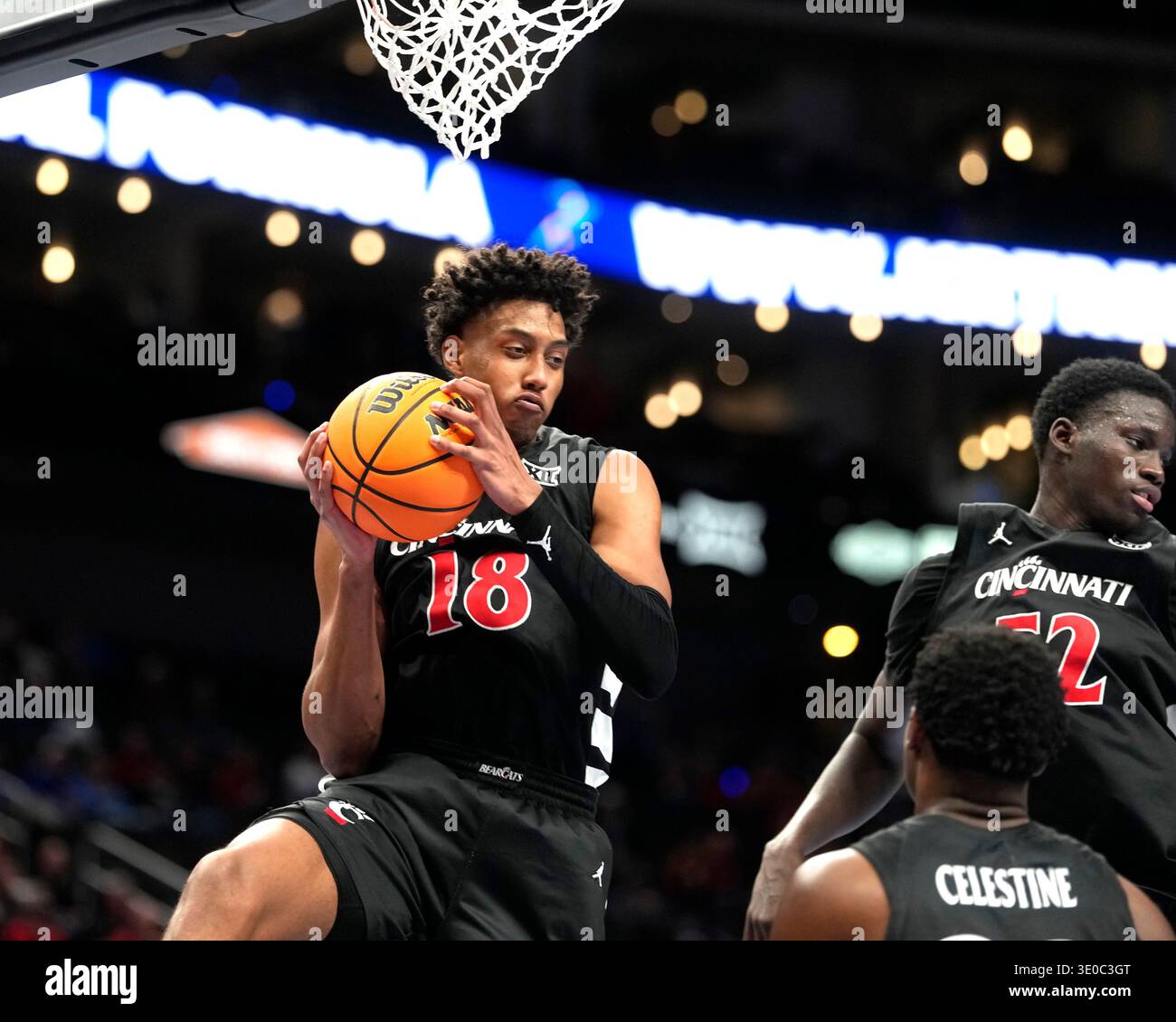 MAR 11 2026: Cincinnati Bearcats forward Baba Miller (18) pulls down an ...