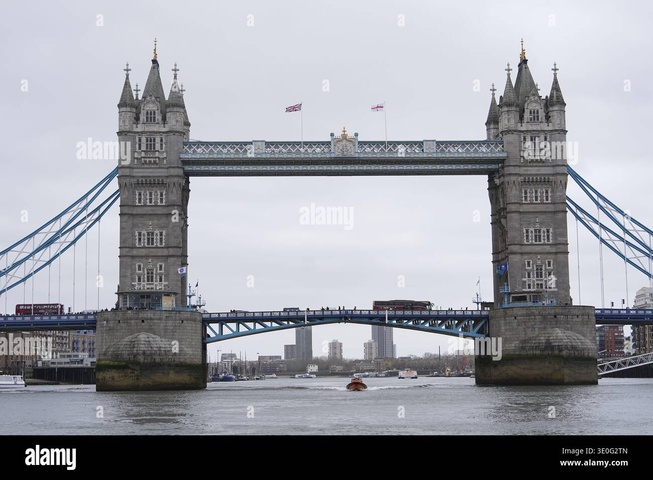 The Prince and Princess of Wales pass Tower Bridge on the River Thames ...