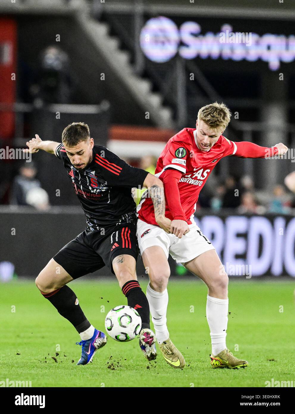 ALKMAAR - (l-r) Matej Rynes of Sparta Prague, Isak Jensen of AZ Alkmaar ...
