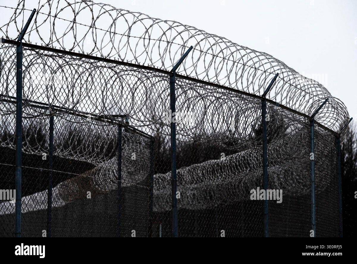 Razor wire lines the perimeter fences at the Northwest State ...
