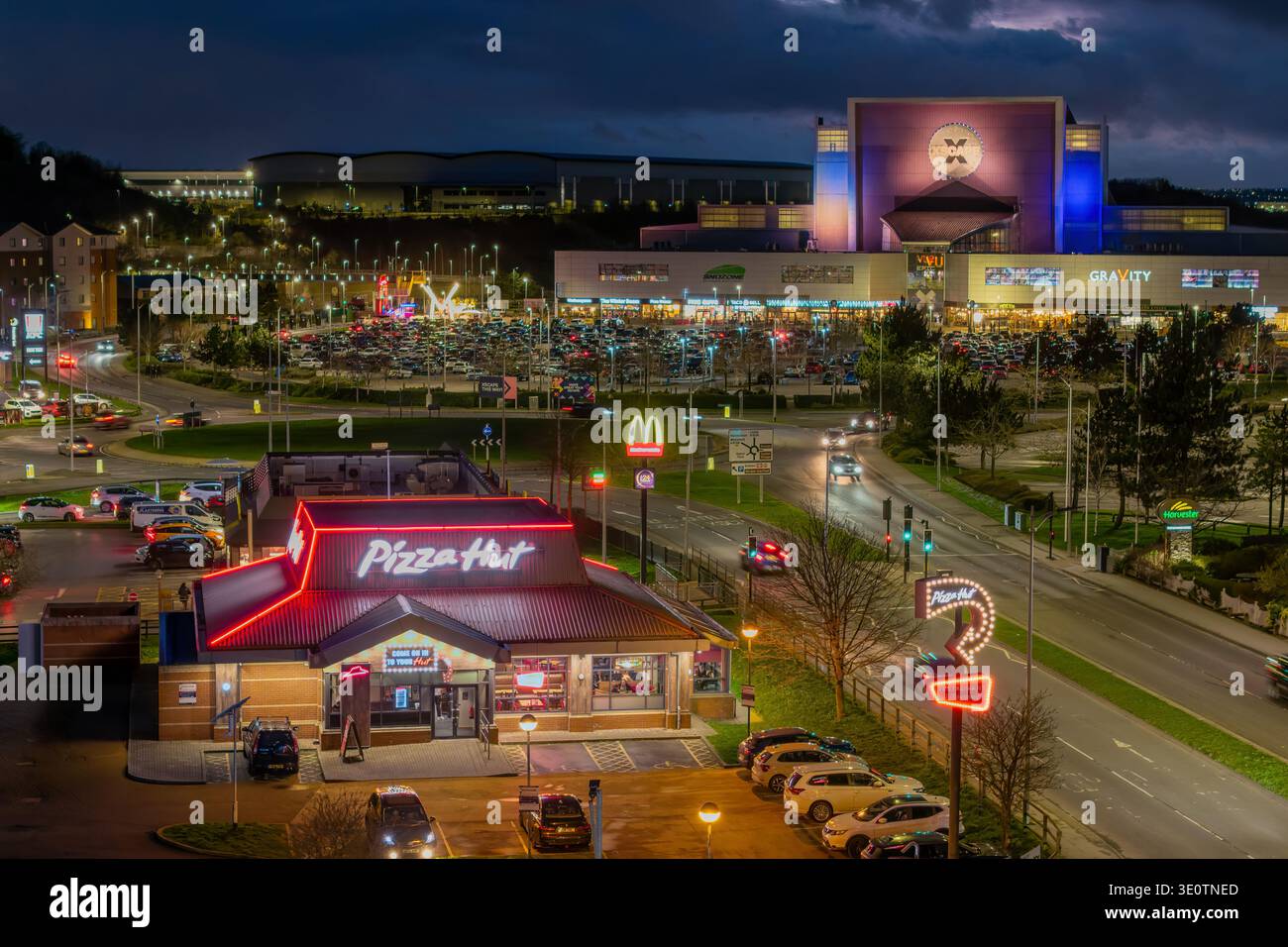 Castleford Xscape ski slope aerial view at dusk, indoor skiing leisure ...