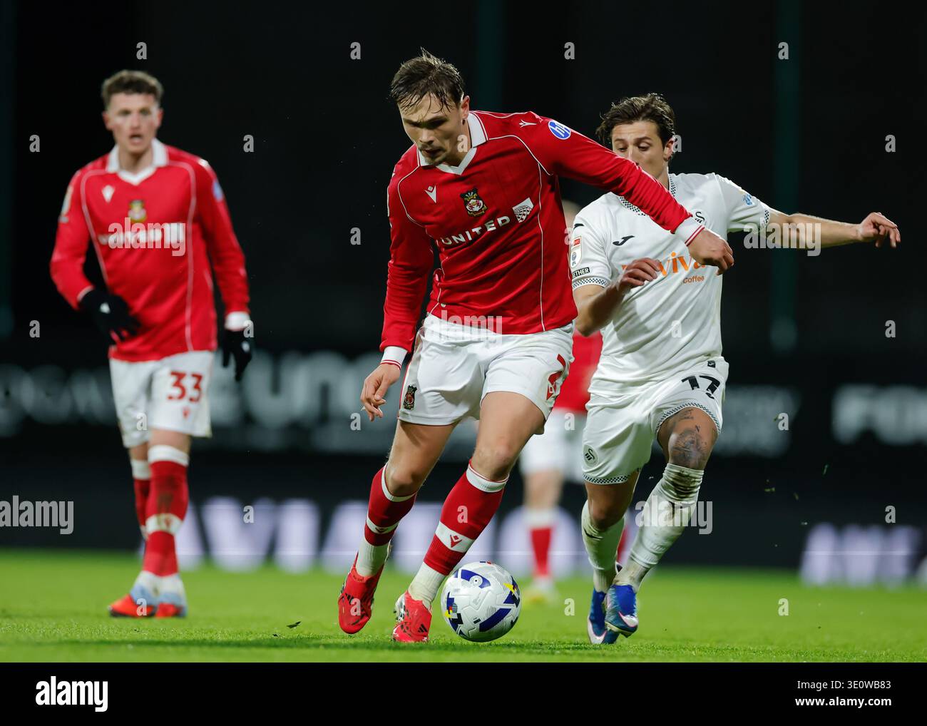 Wrexham, UK. 13th Mar, 2026. Callum Doyle of Wrexham breaks forwards ...