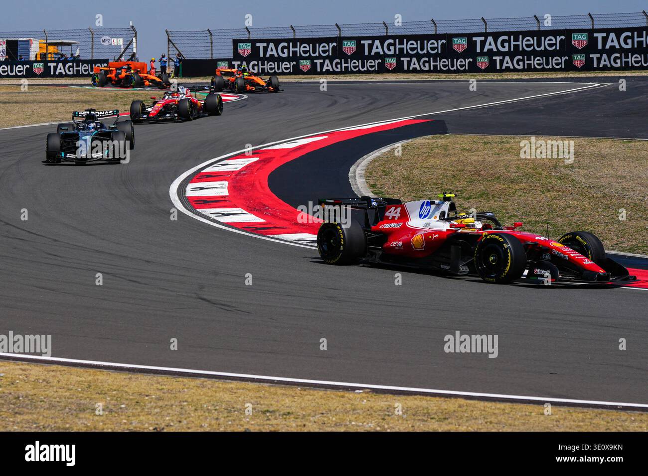 Ferrari’s Lewis Hamilton and other F1 car in action during sprint at ...