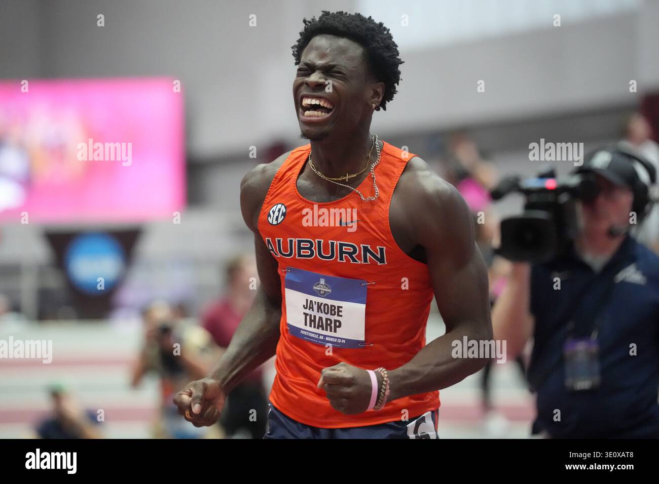 Ja'Kobe Tharp of Auburn celebrates after winning 60m hurdles heat in 7. ...